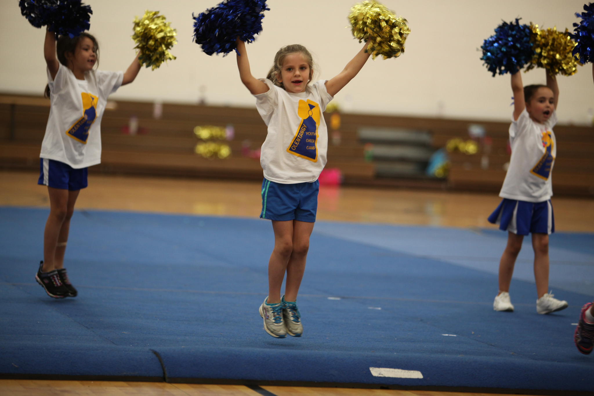 Cousins Watch the Cheerleading Performance – Ruth E. Hendricks